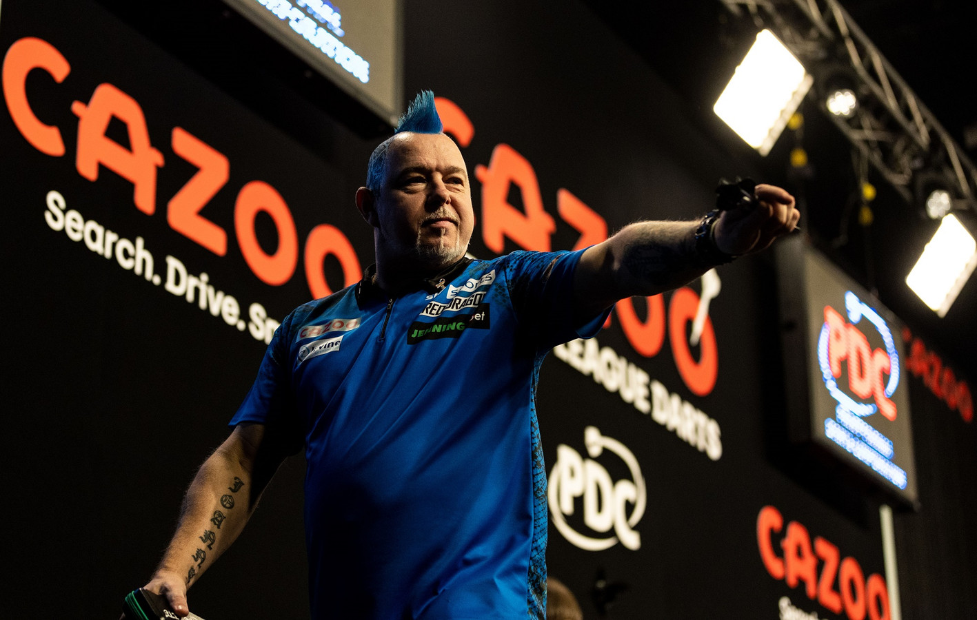 Van verlegen bandenmonteur naar nummer 1 van de wereld: Peter Wright ...