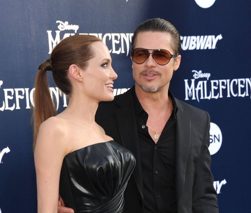 Brad Pitt reageert op 'gek' op rode loper | Foto | hln.be