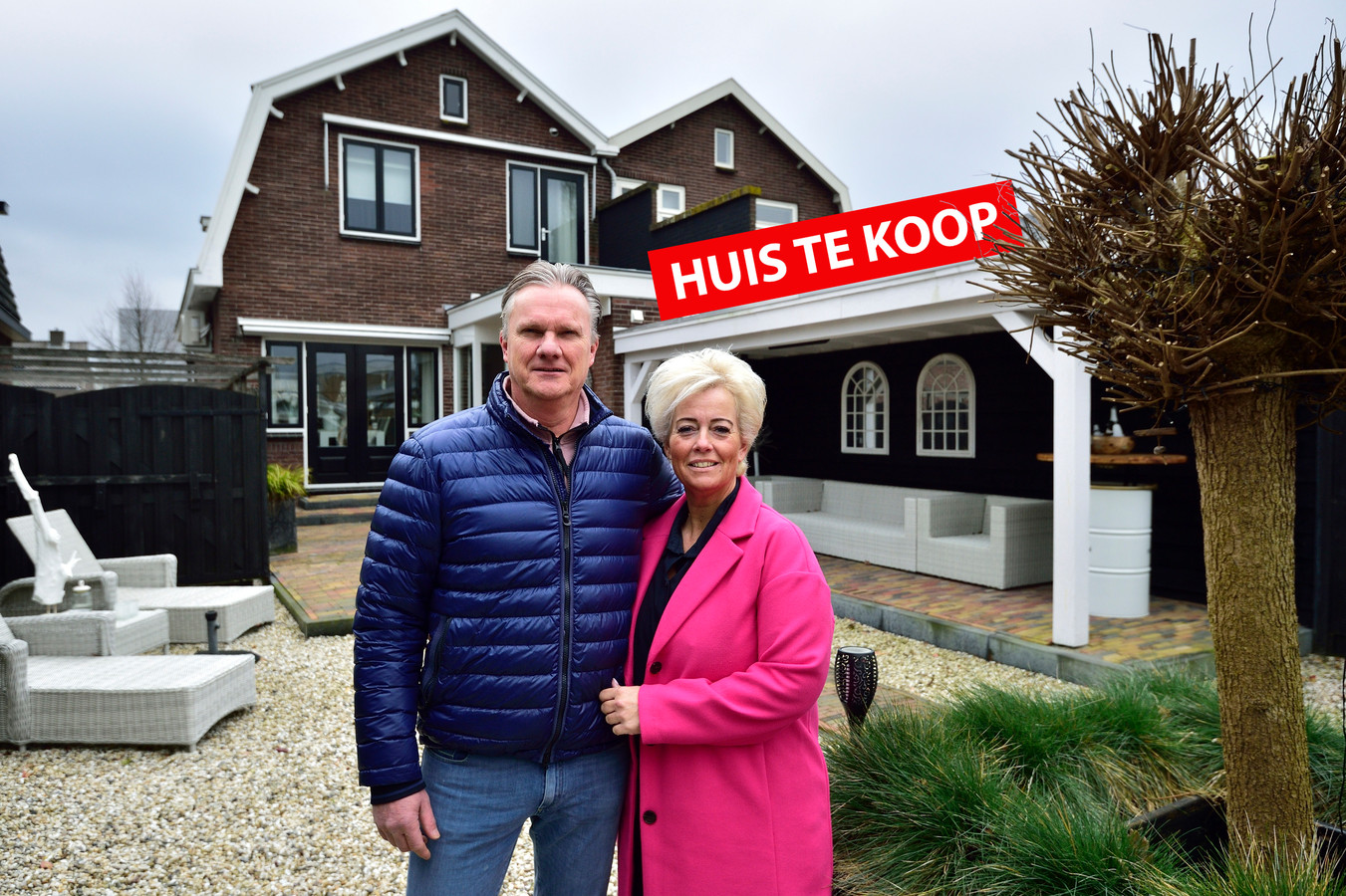 Achtertuin van dit huis heeft de sfeer van een strandtent, compleet met ...