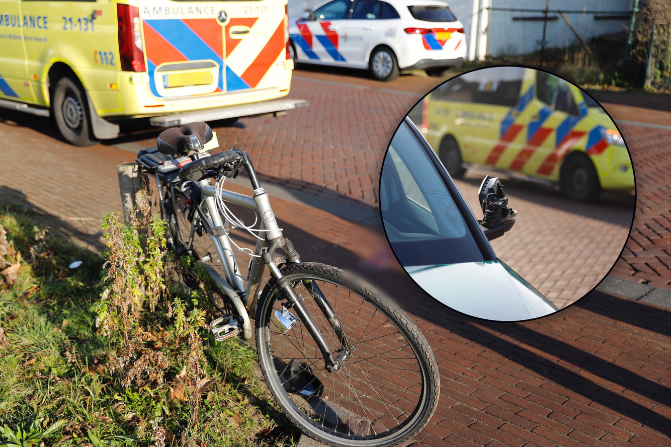 Fietser gaat onderuit na botsing met autospiegel en raakt gewond aan ...